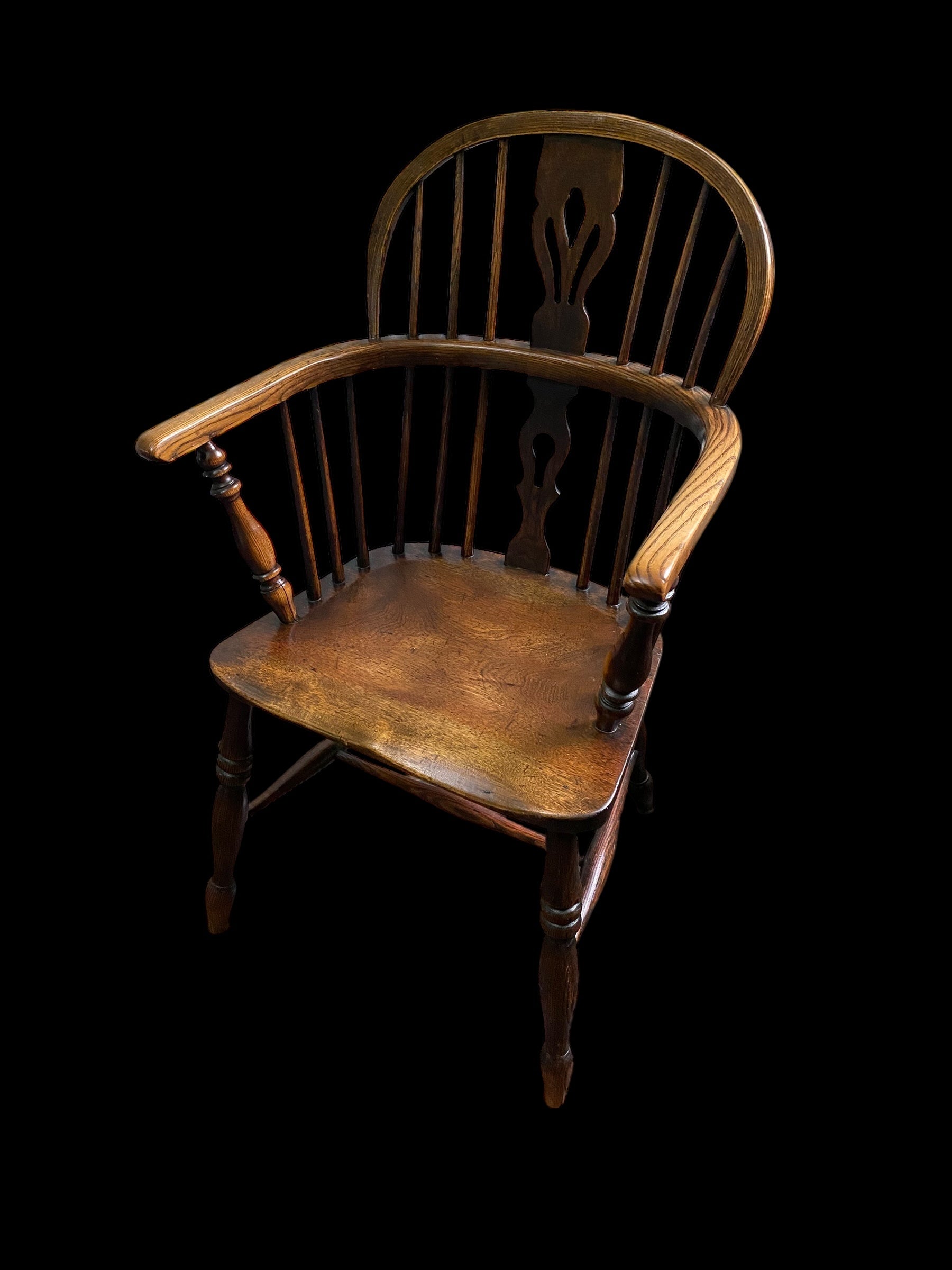 An early Victorian Ash & Elm comb back Windsor chair with carved splat ...